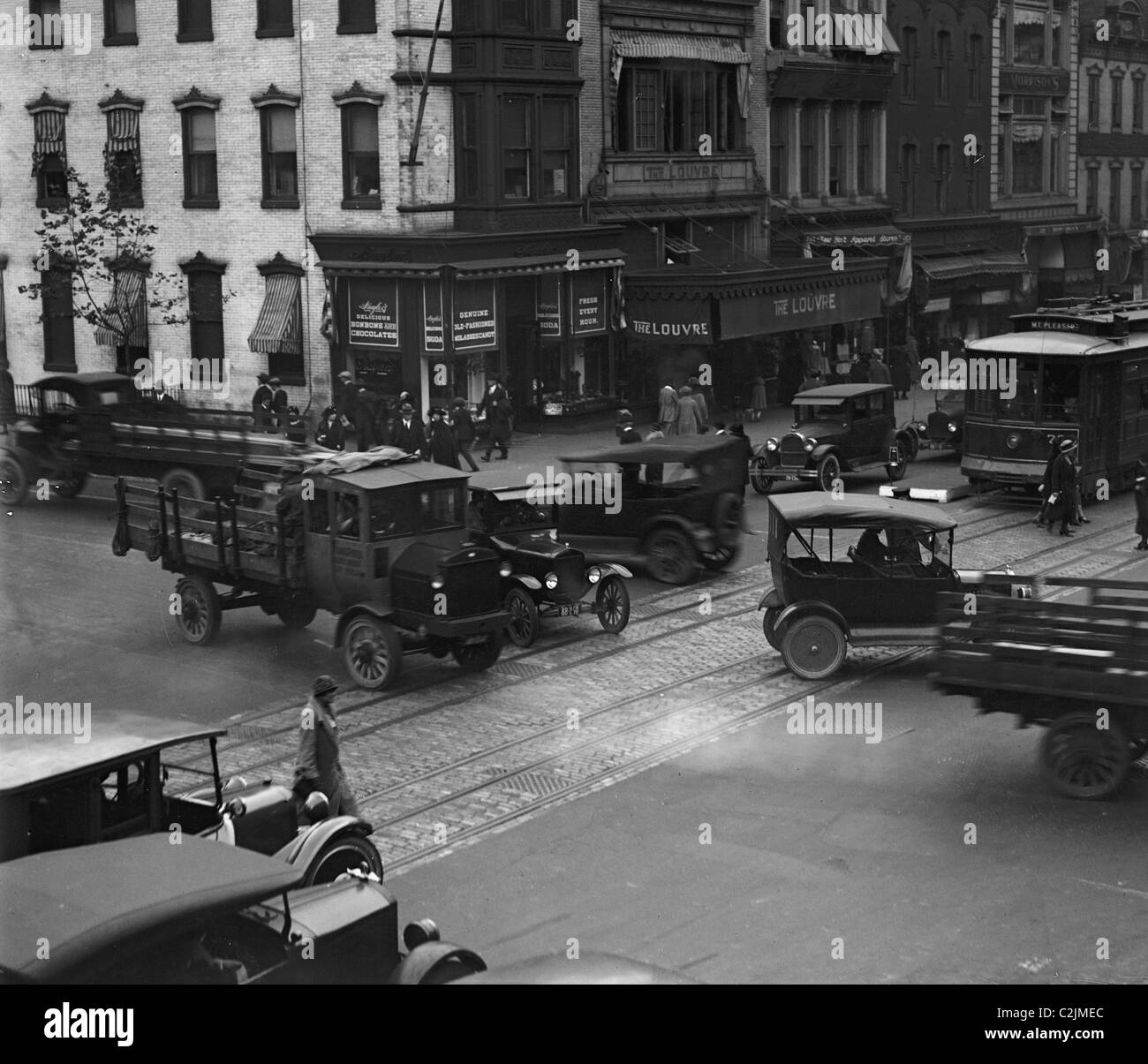 Street Corner in Washington DC with trucks park and growing traffic ...