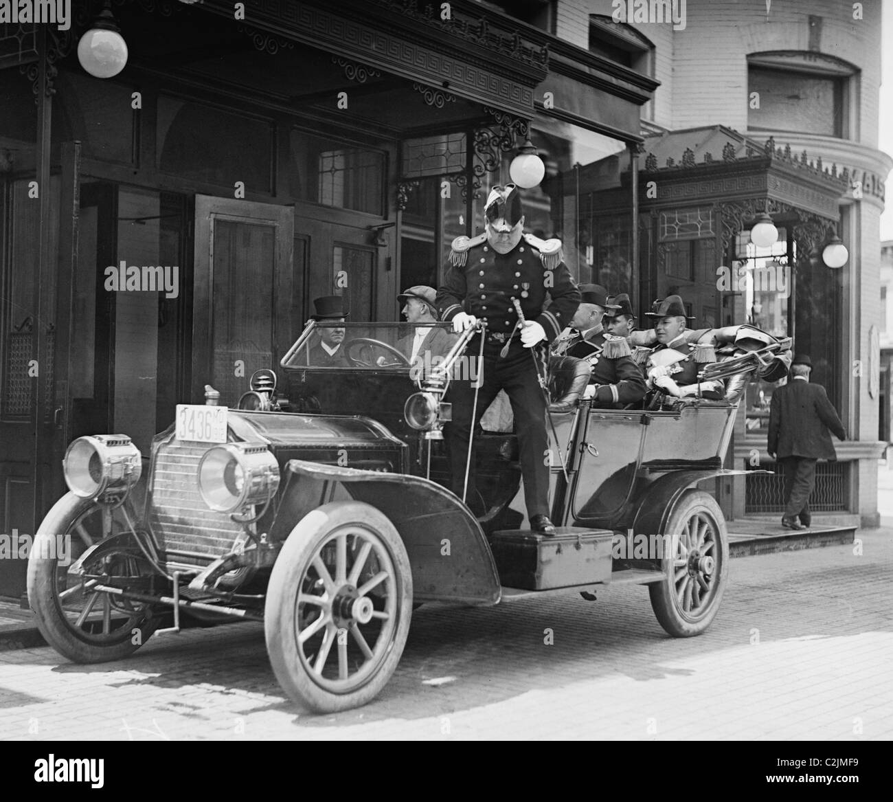 German Military attaché alights from his coupe with others of the ...