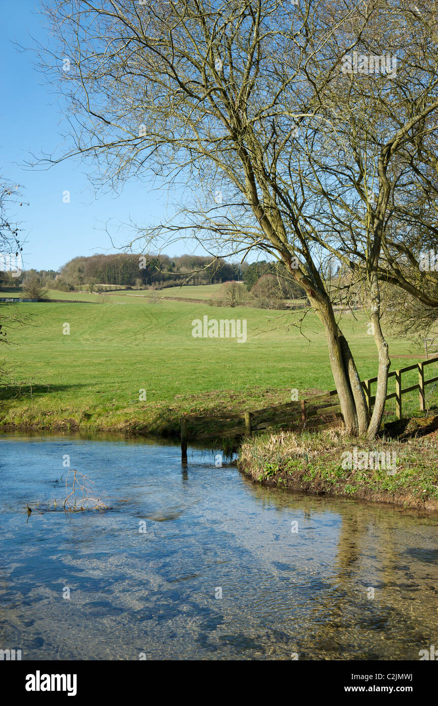 The River Rye flowing between Upper and Lower Slaughter in the ...