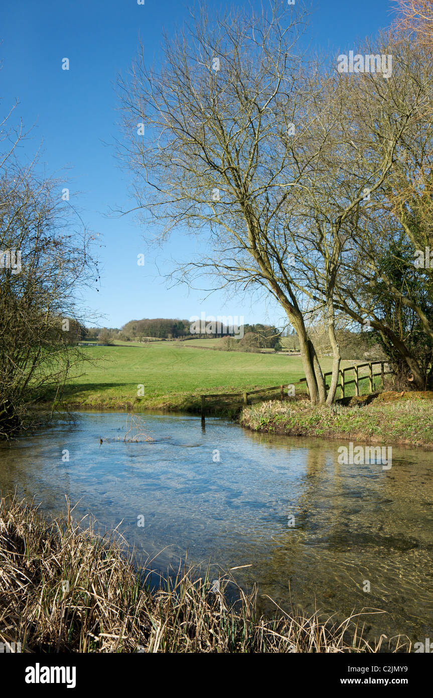 The River Rye flowing between Upper and Lower Slaughter in the ...