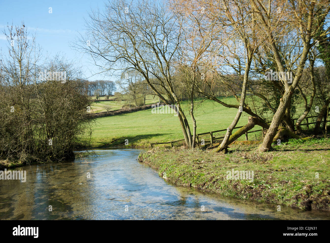 The River Rye flowing between Upper and Lower Slaughter in the ...