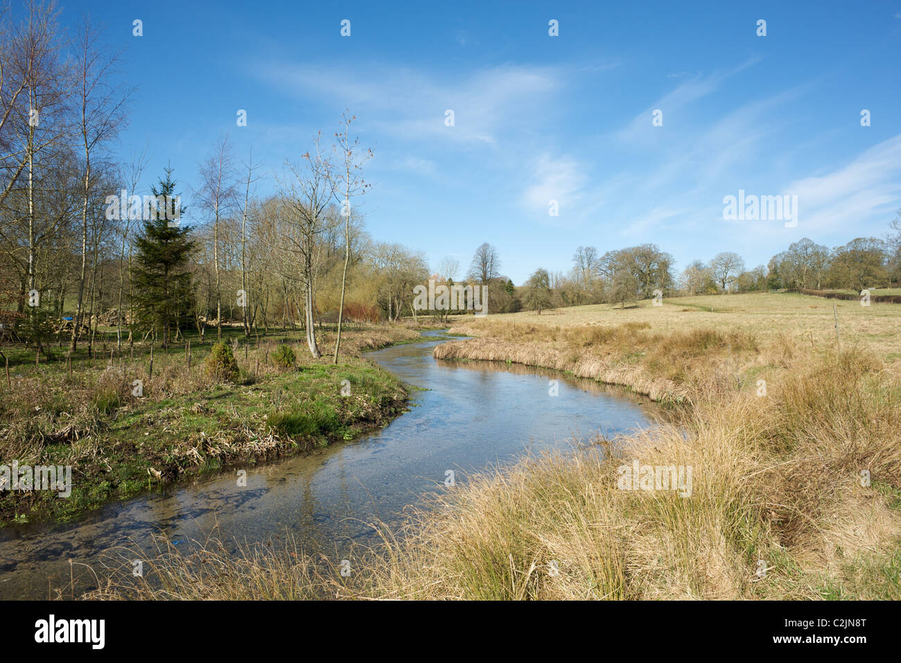 The River Rye flowing between Upper and Lower Slaughter in the ...