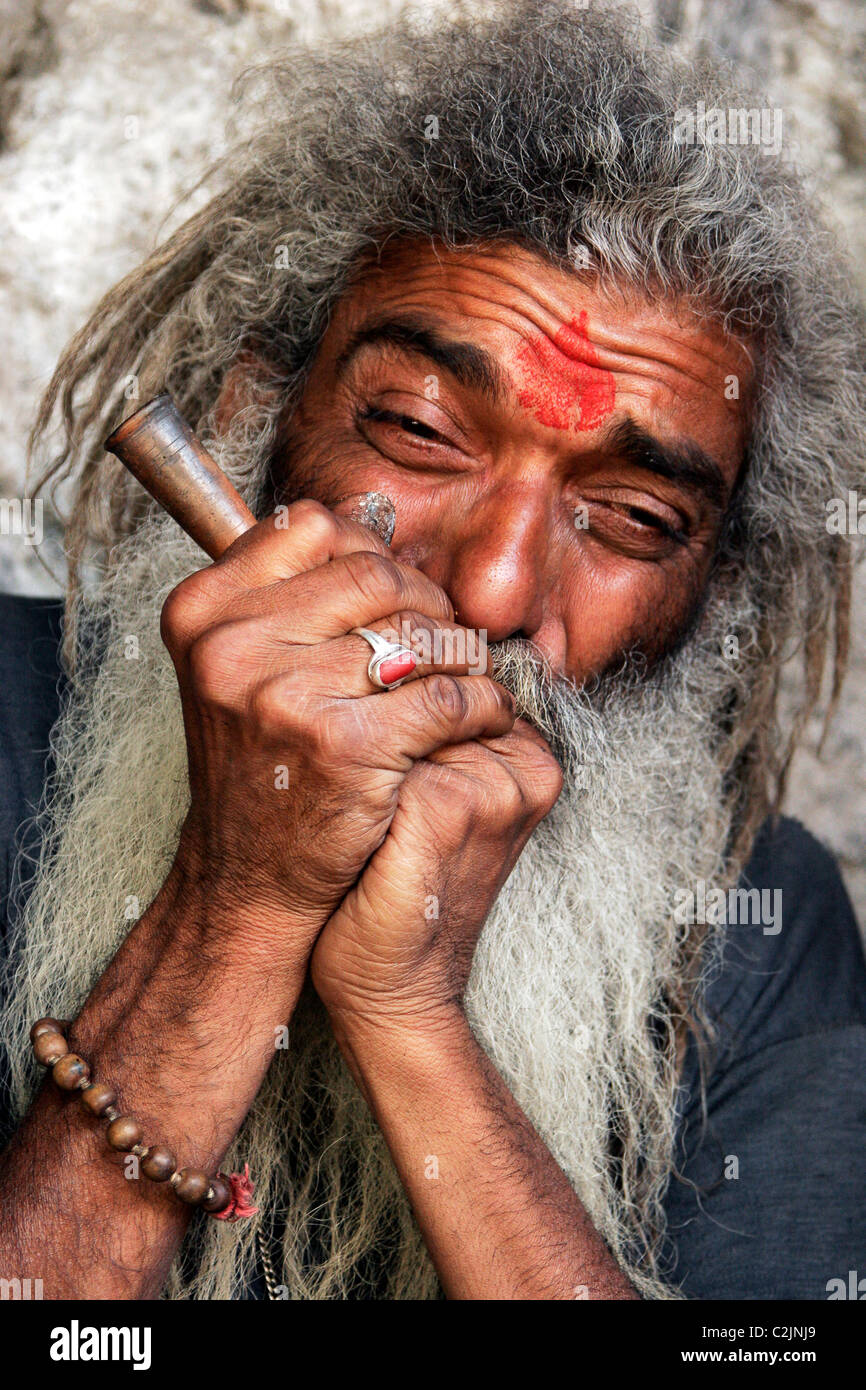 Blowing chilam hi-res stock photography and images - Alamy