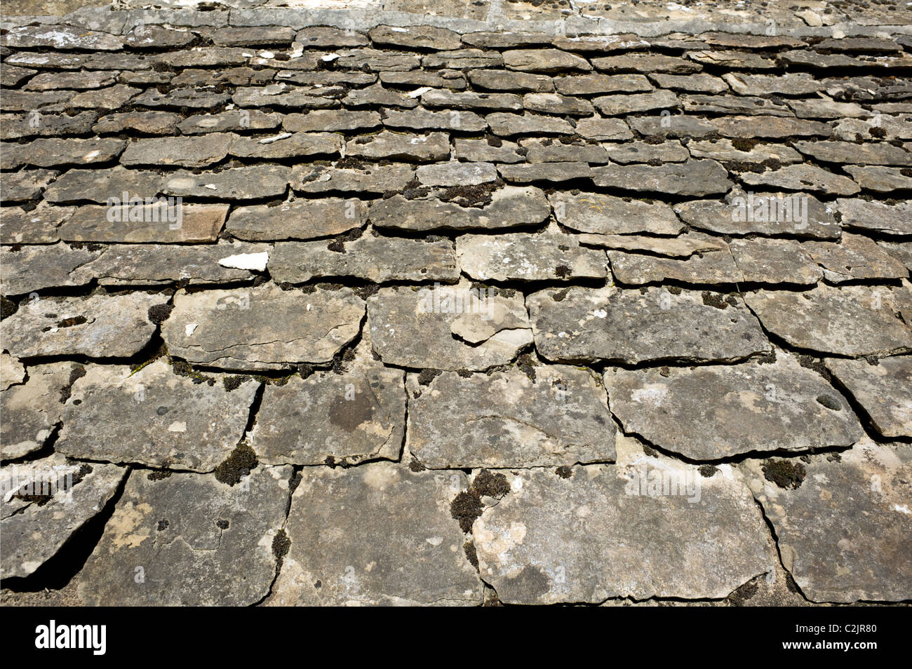 The slate roof on the Parish Church of St. Peter, Upper Slaughter, the ...