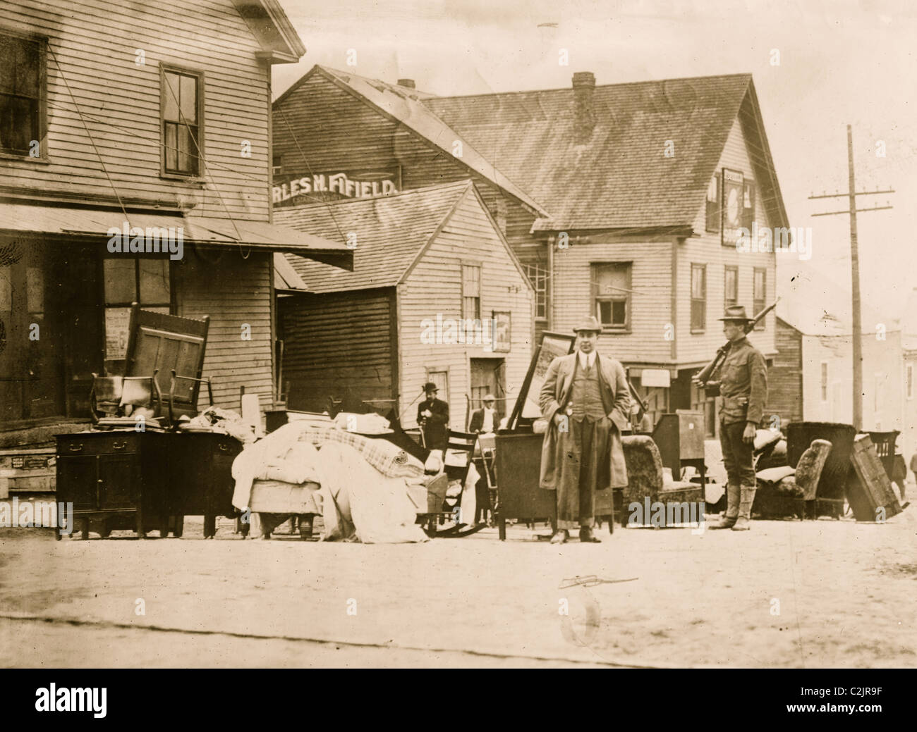 Soldier guarding household effects, Bangor fire Stock Photo - Alamy