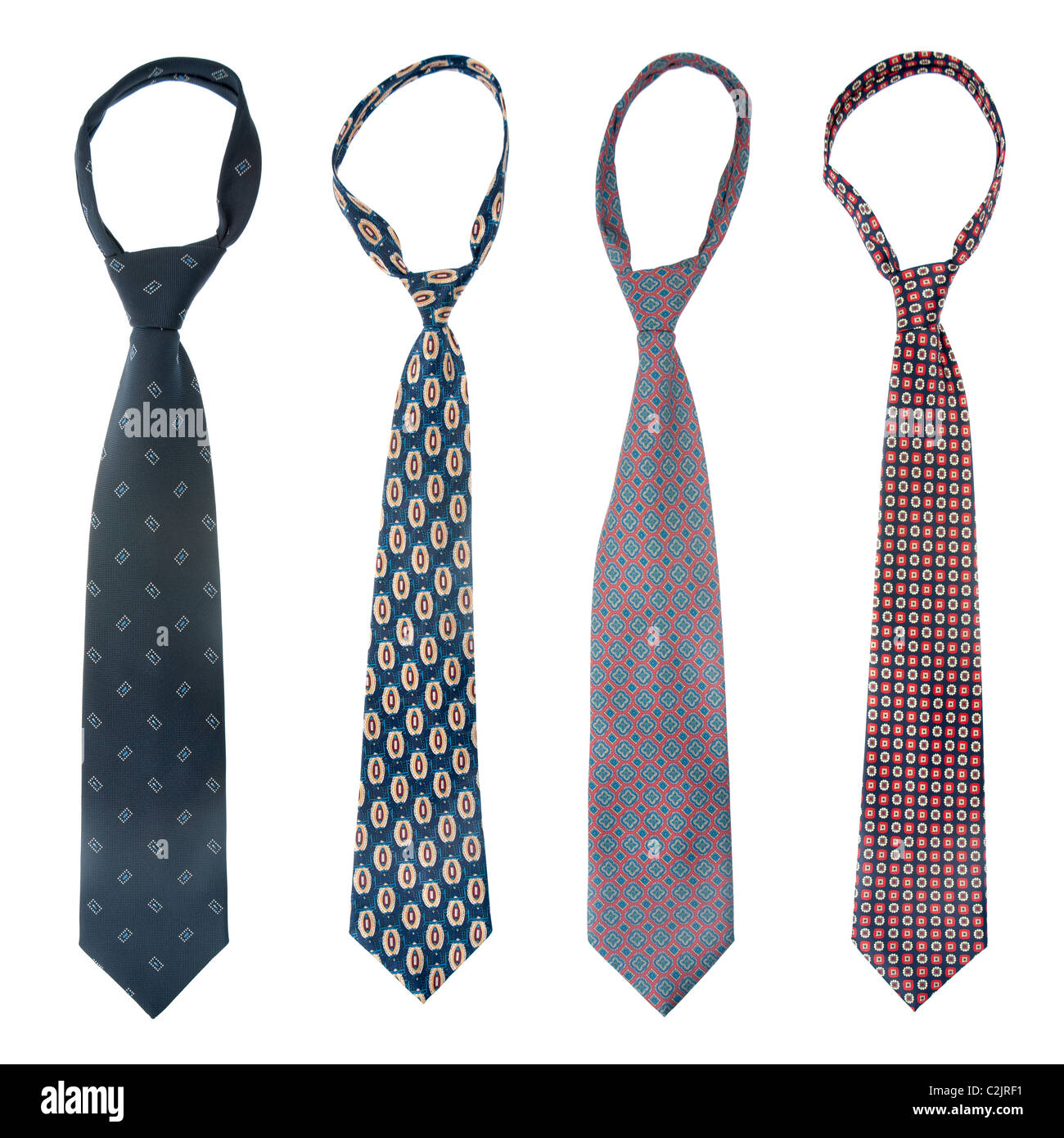 Four ties isolated on white background Stock Photo - Alamy