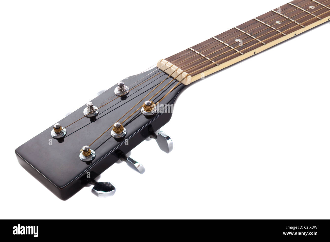 Guitar scroll closeup isolated on white background Stock Photo - Alamy