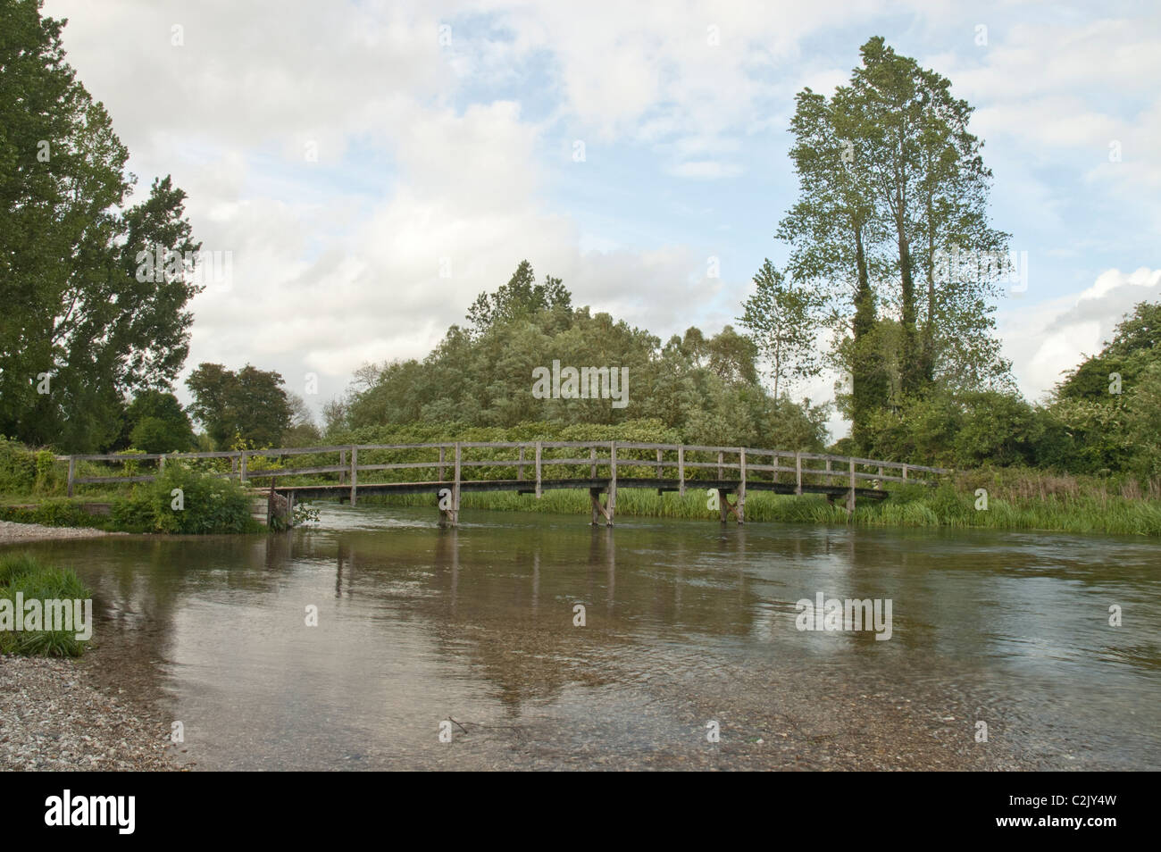 wooden bridge over River Test Houghton at Sheepbridge near Stockbridge ...