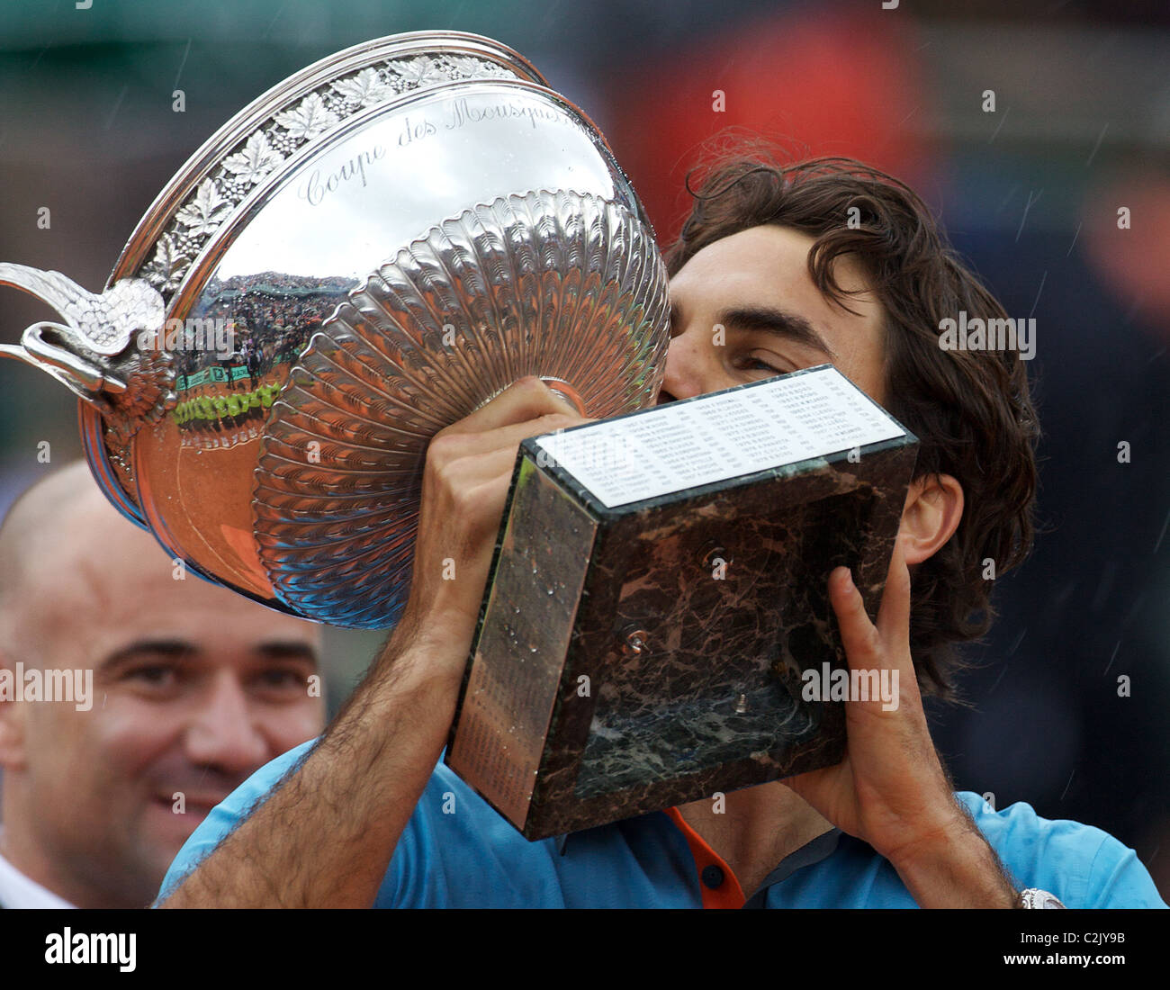 Roger Federer, Switzerland, kisses the trophy after winning the French ...