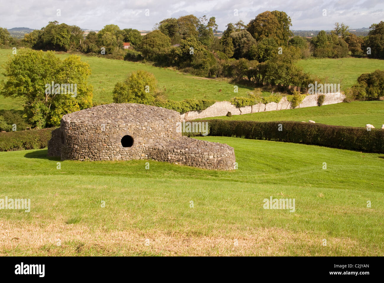 Stone structure and countryside, Newgrange, County Meath, Ireland Stock ...
