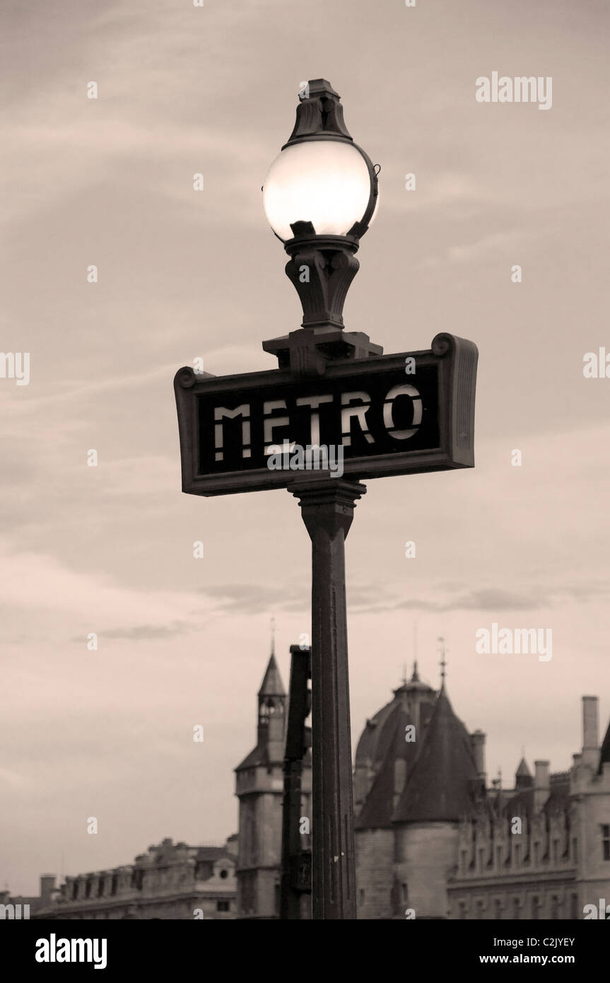 Metro sign on lampost at sunset, Paris, France Stock Photo - Alamy