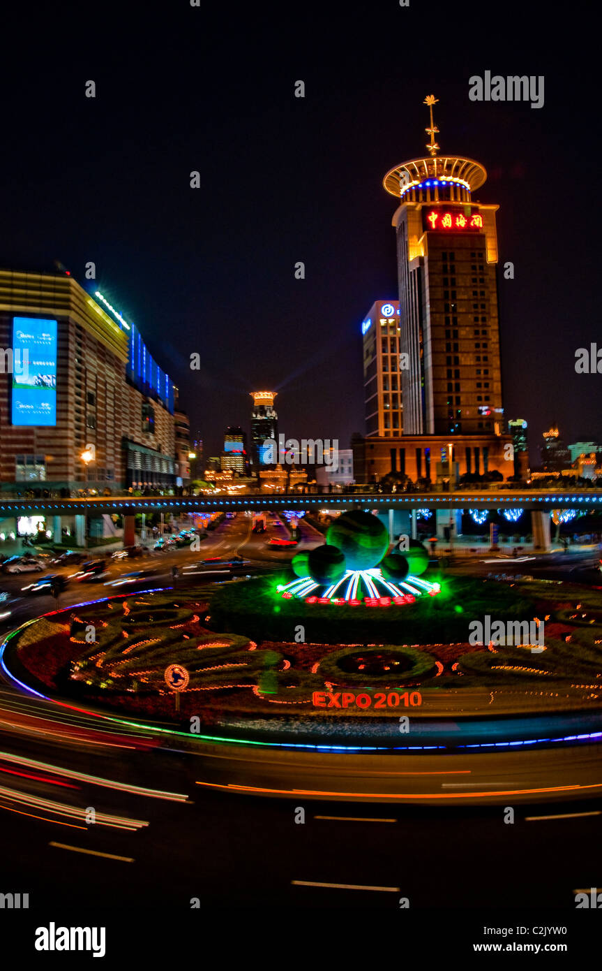 Cars zoom past Shanghai city at night Stock Photo - Alamy