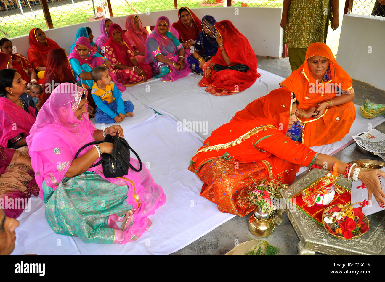 Women from Rajasthan, India doing worship Stock Photo - Alamy
