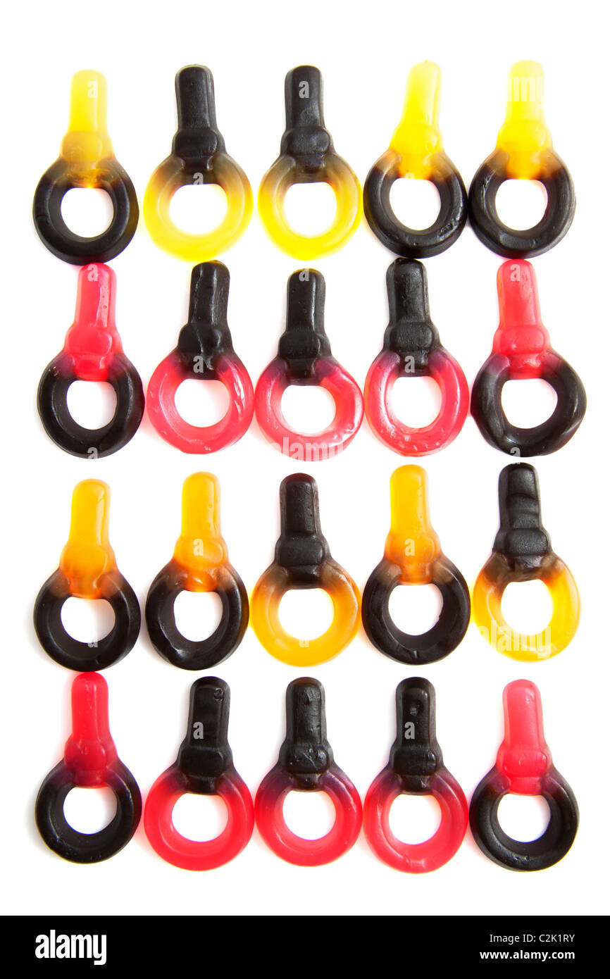 Candy keys in a row isolated over white Stock Photo - Alamy