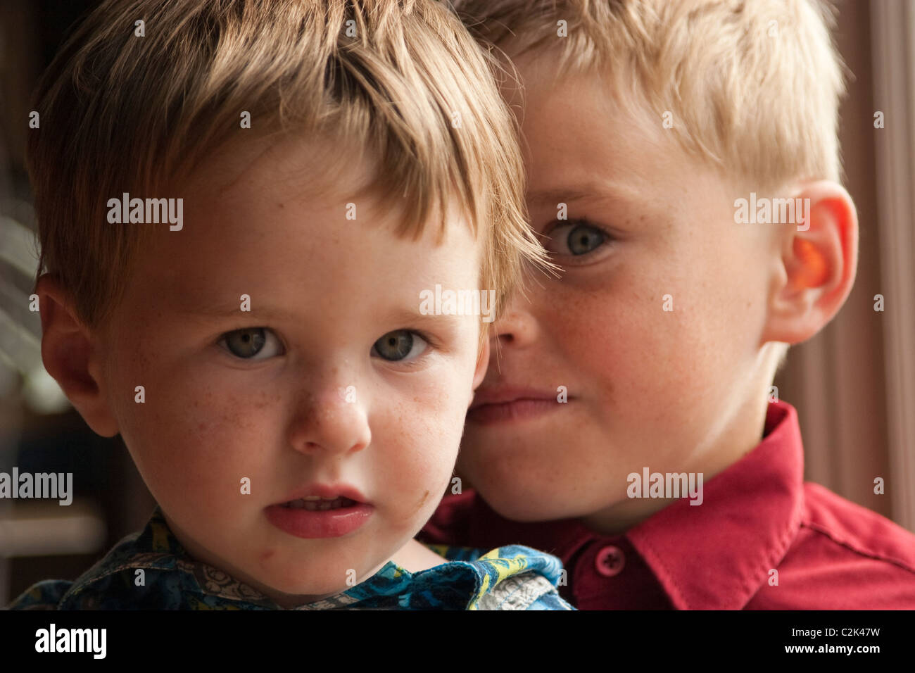 Portrait of 2 brothers playing and having fun Stock Photo - Alamy