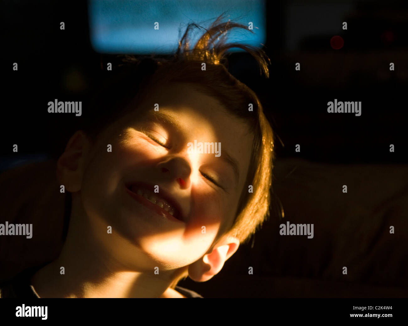 A happy 4 year old boy bathing in sunlight Stock Photo - Alamy