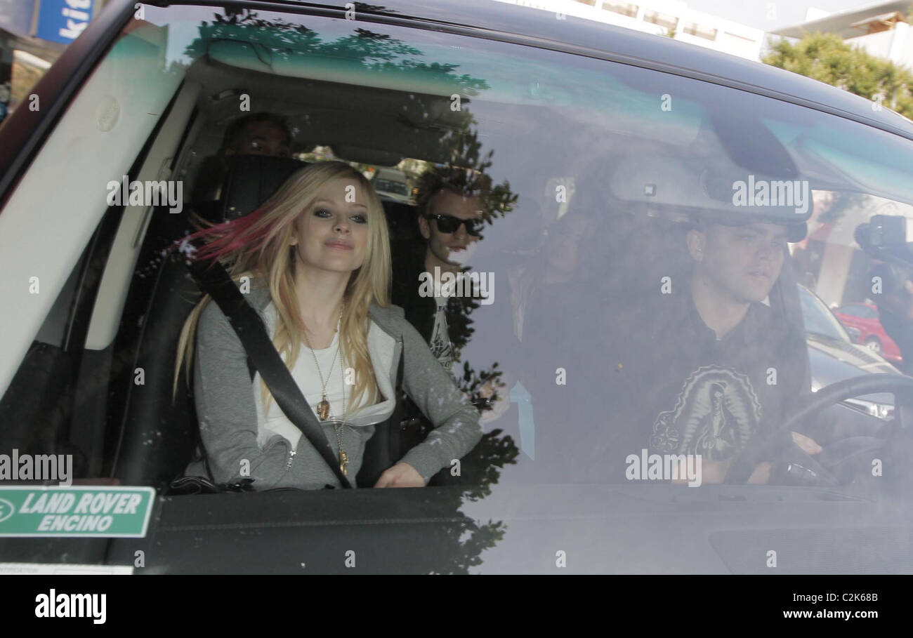 Avril Lavigne and her husband Deryck Whibley shop at baby stores on ...