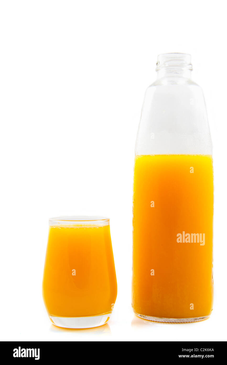 Pouring orange juice glass Cut Out Stock Images & Pictures - Alamy
