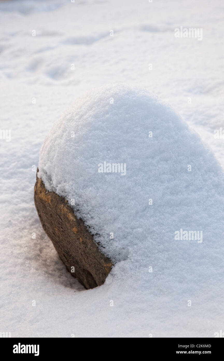A Boulder Covered With Snow Stock Photo - Alamy