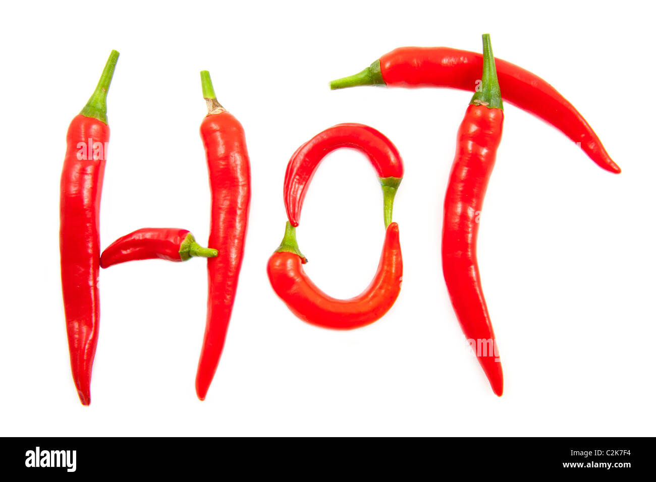 Hot written with peppers isolated over white Stock Photo - Alamy