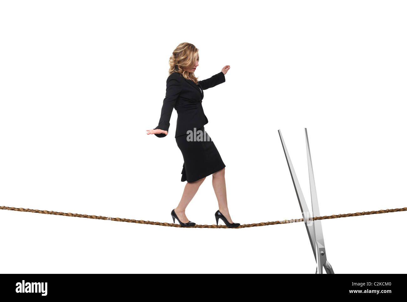 young blonde acrobat on rope isolated on white and silver scissor Stock ...