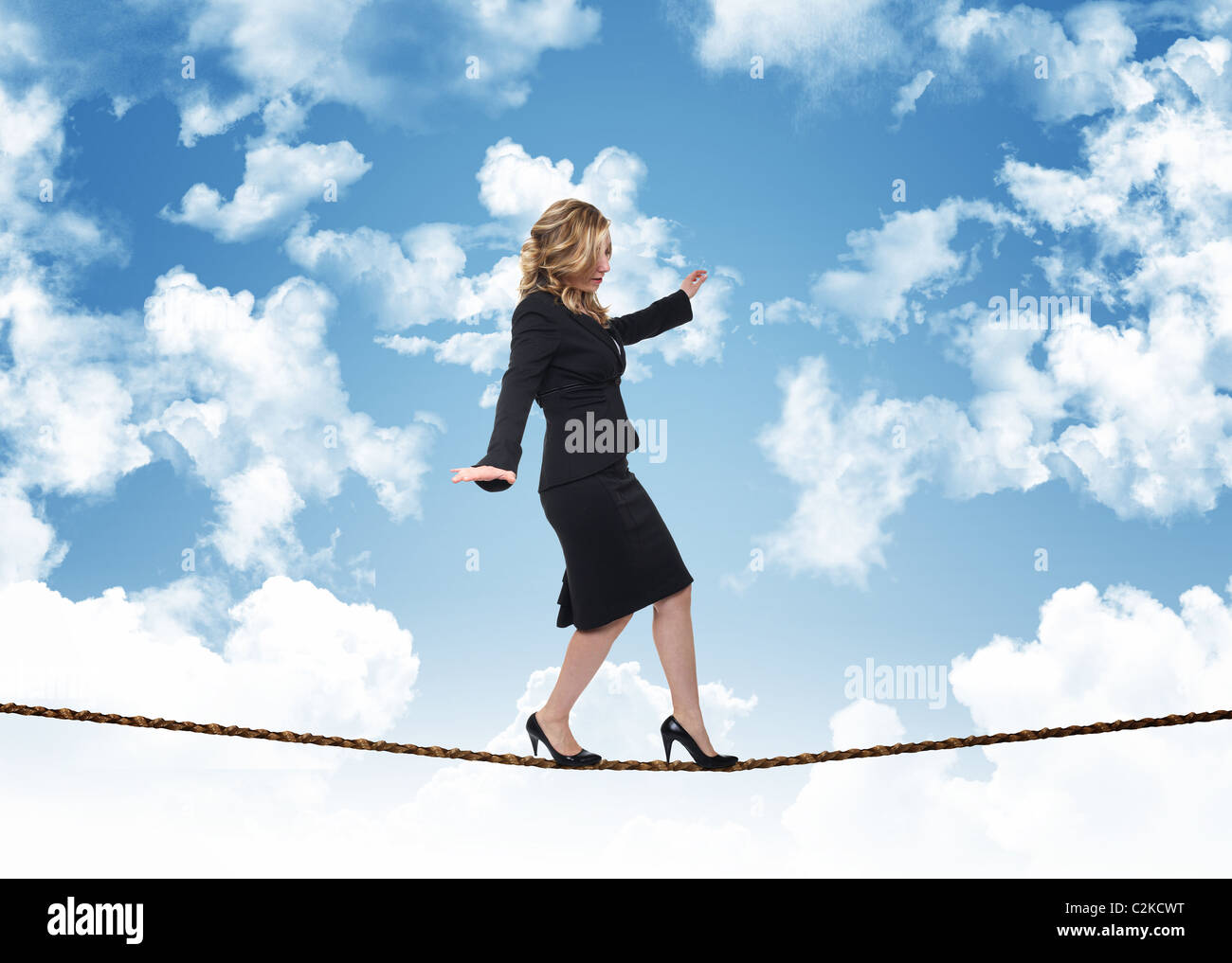 woman on rope and blue sky with clouds Stock Photo - Alamy