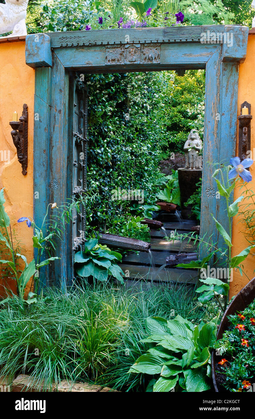 Indian themed water feature in a courtyard setting Stock Photo - Alamy