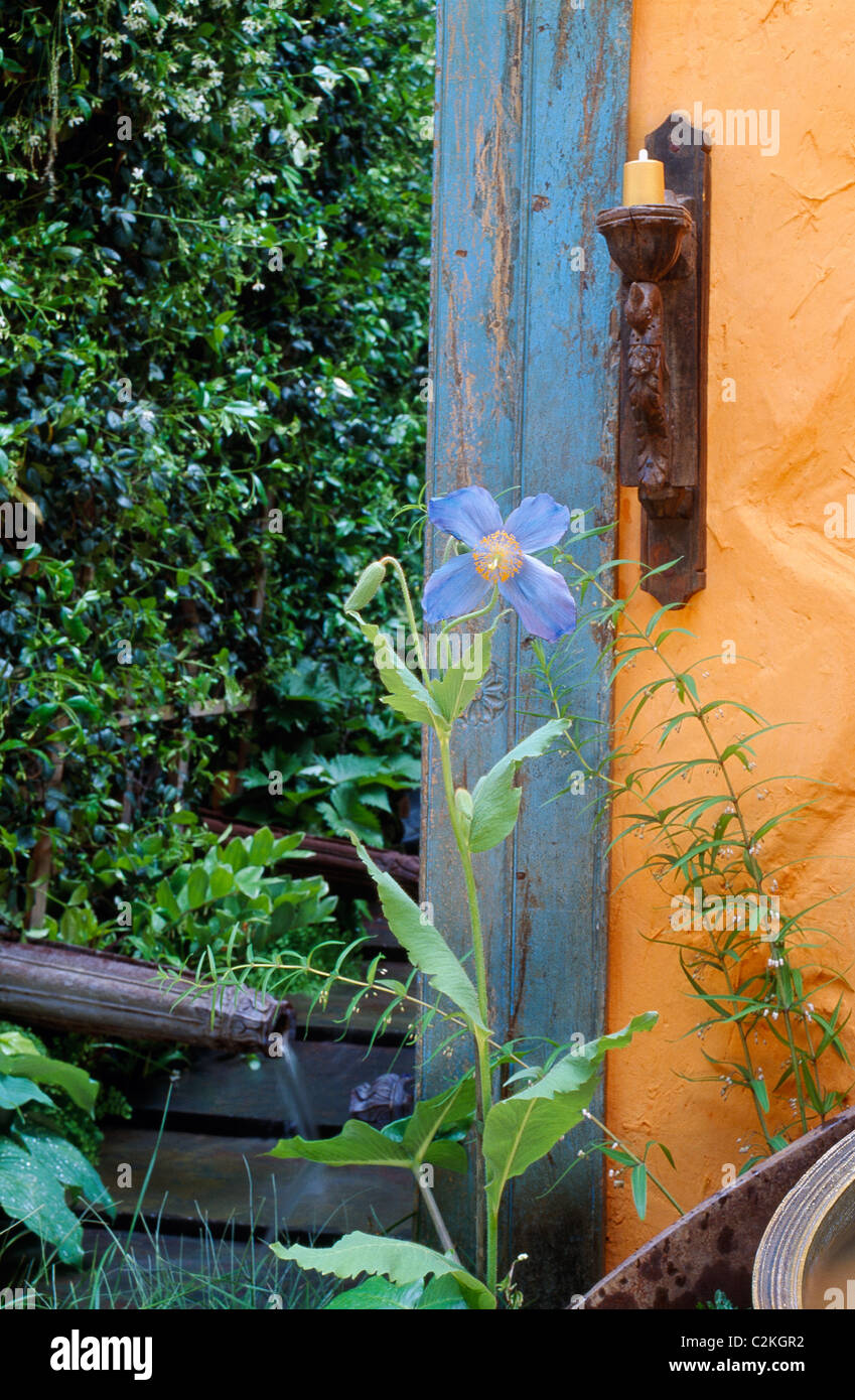 Indian themed water feature in a courtyard setting Stock Photo - Alamy