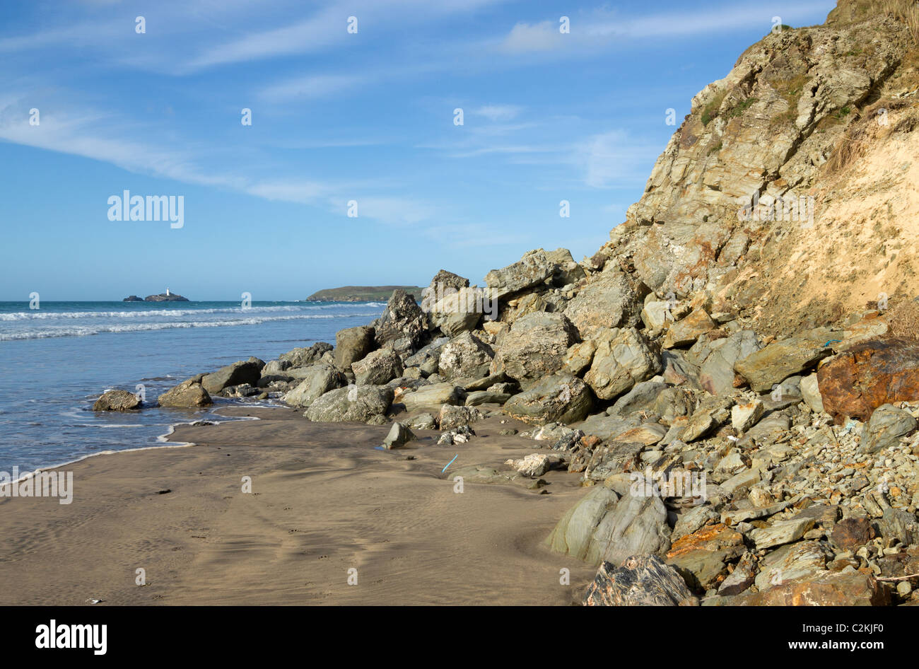 Large cliff rock fall on a beach near Gwithian Towans in Cornwall UK ...