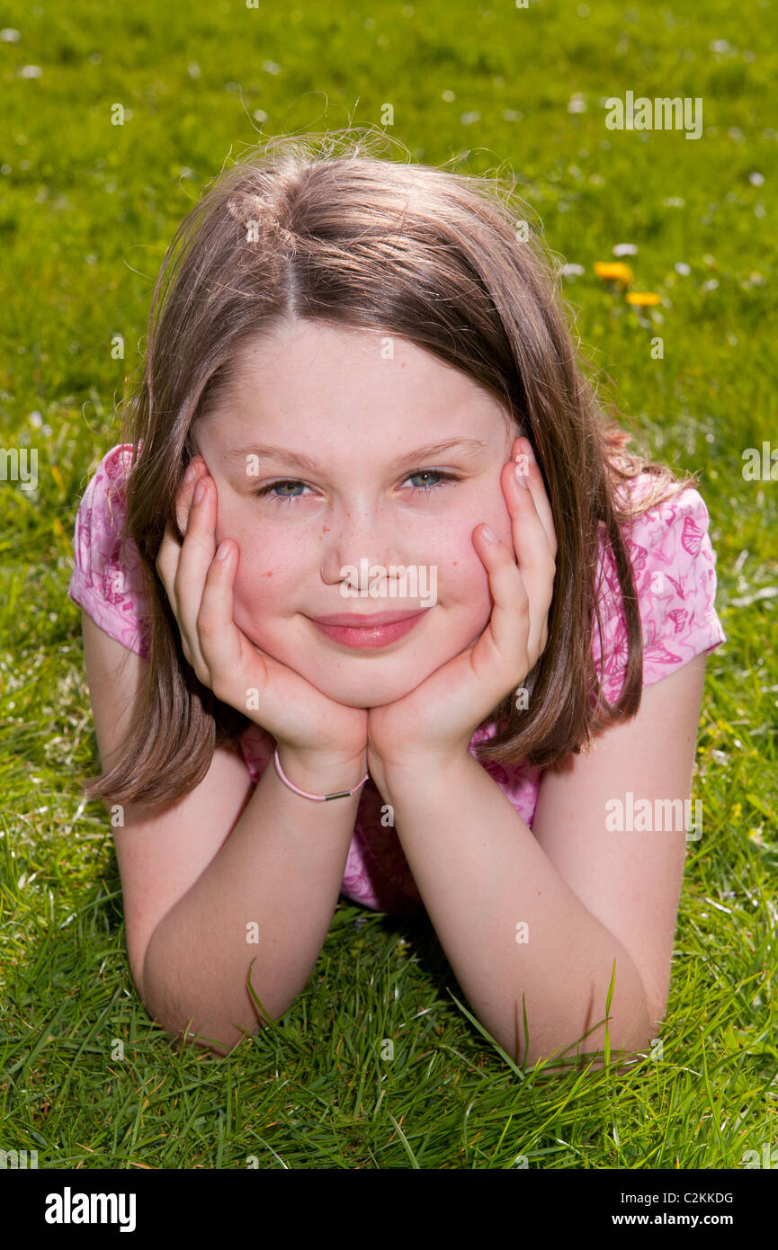 A Model Released Picture Of A Nine Year Old Girl Outdoors Laying On The