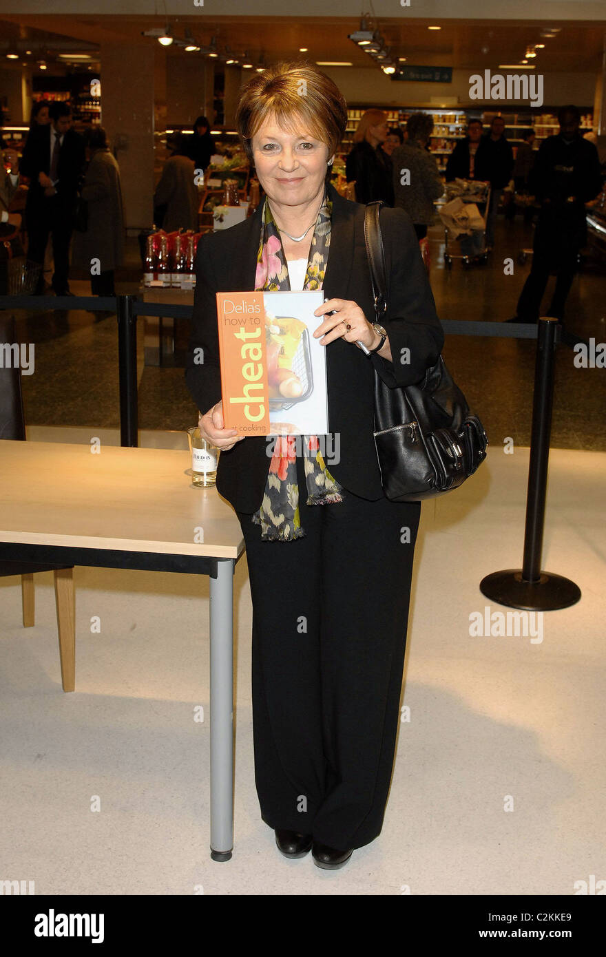 Delia smith signs copies book how cheat cooking hi-res stock ...