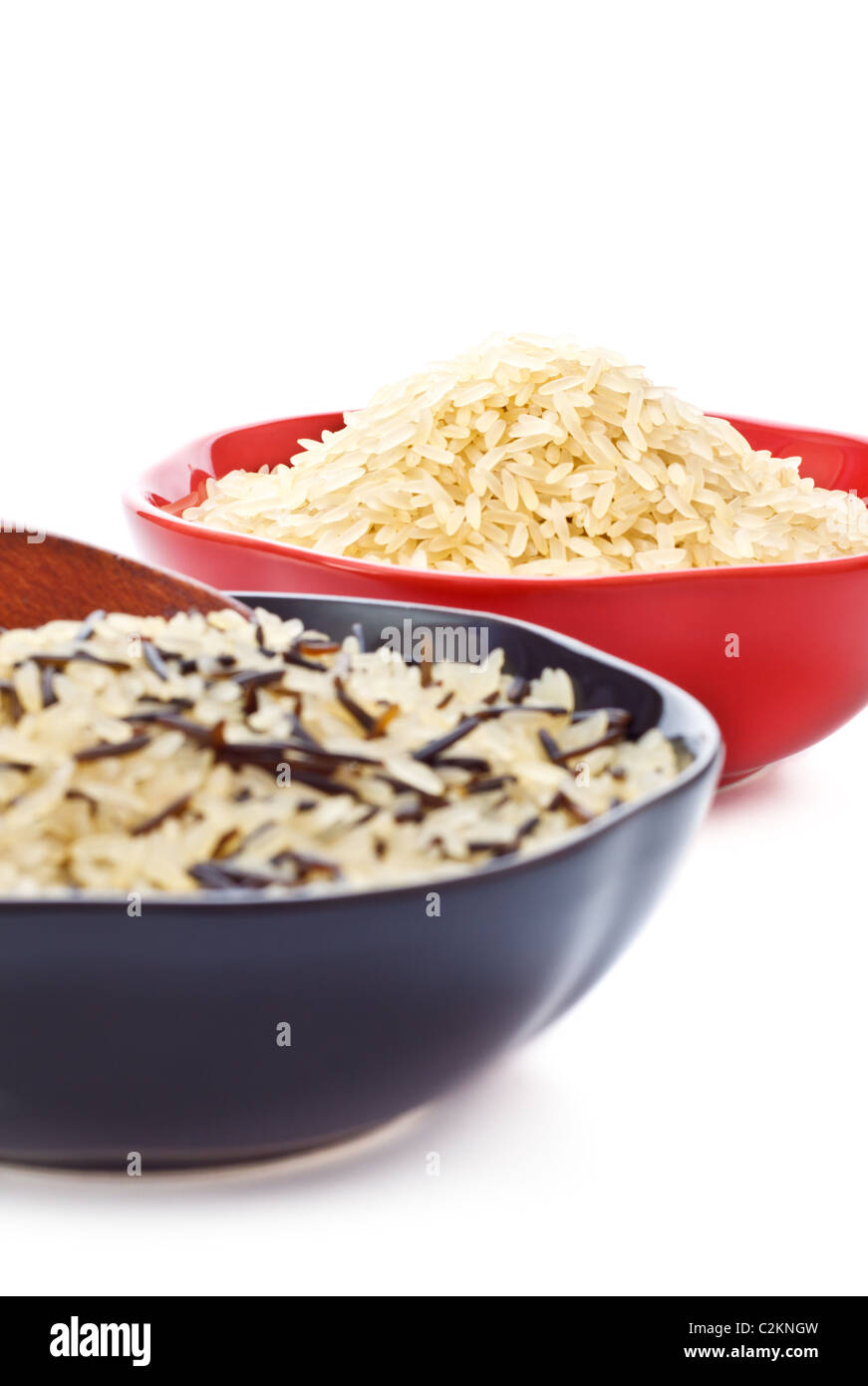 two bowls with rice and wooden spoon Stock Photo - Alamy