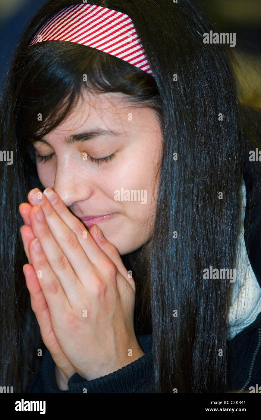 A Teenage Girl Praying Stock Photo - Alamy