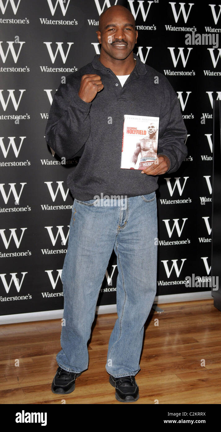 Evander Holyfield signs copies of his new book 'Becoming Holyfield' at ...