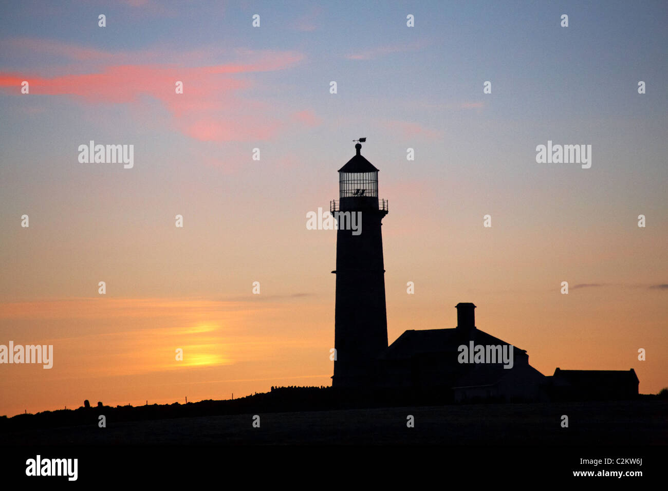 Old light house lighthouse and Old Light cottage in the sunset on Lundy ...