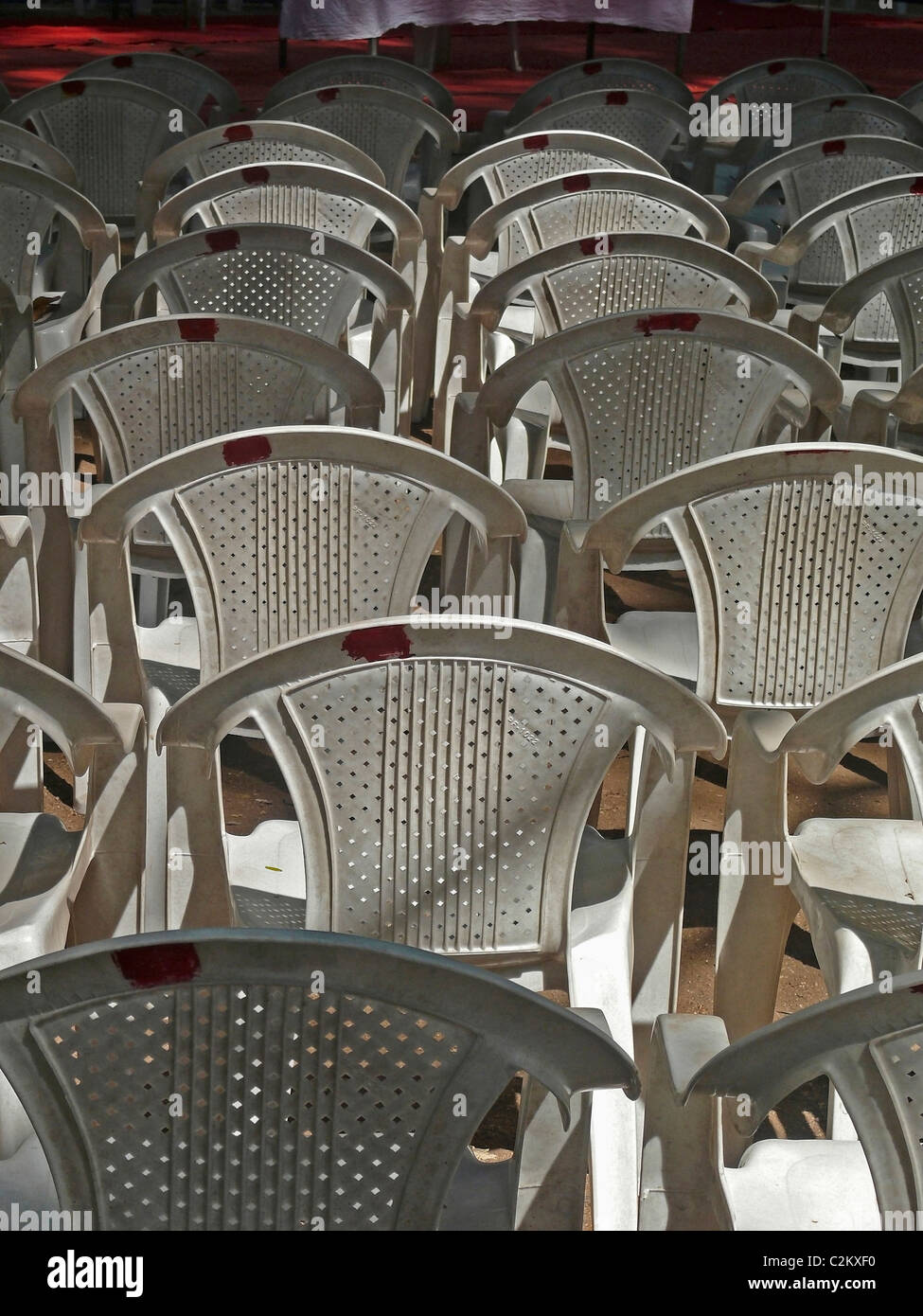 Stacking plastic chairs hi-res stock photography and images - Alamy