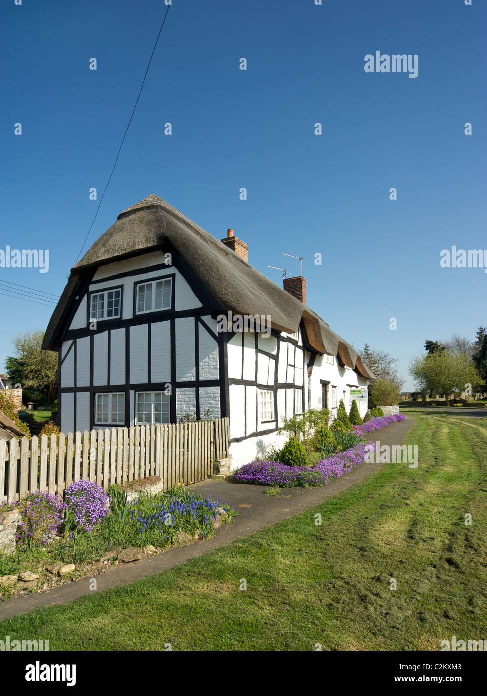 Traditional black and white timber cottages in the small village of ...