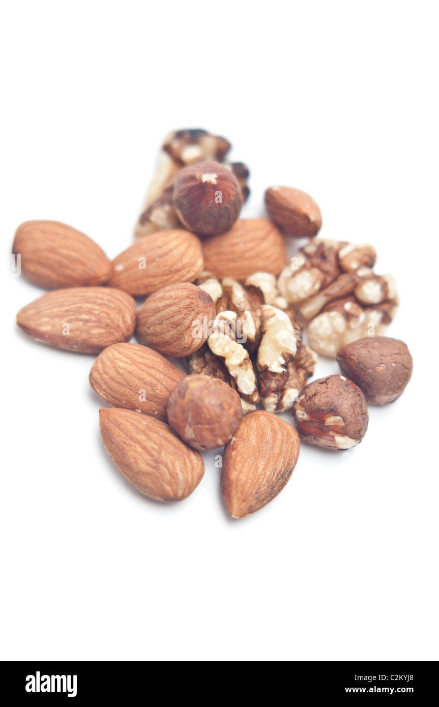 Nut mix with almonds, walnuts on white background Stock Photo - Alamy