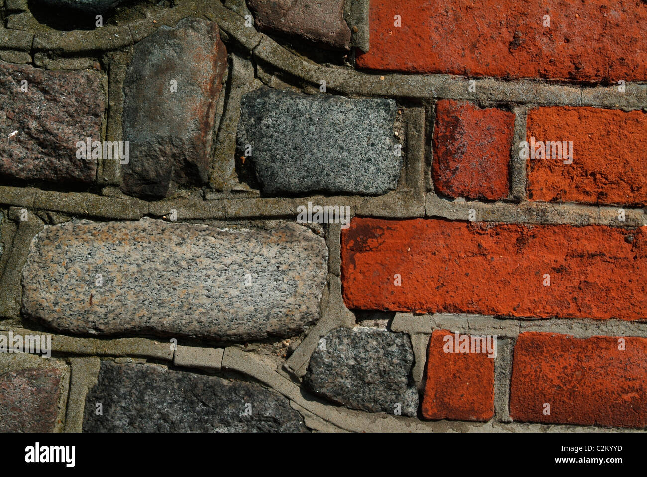Backgrounds - red clay brick and granite cobble wall with mortar Stock ...