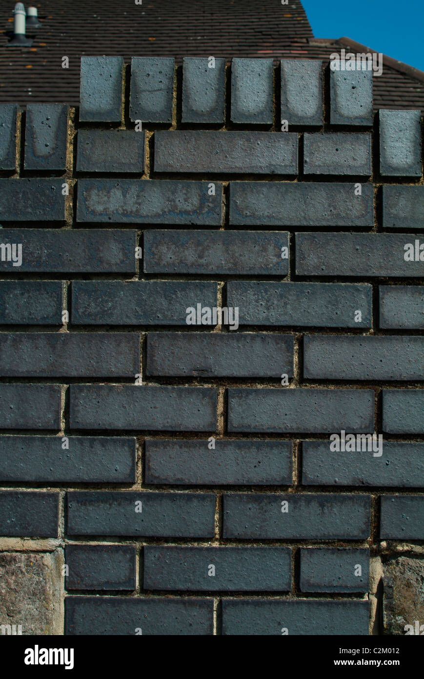 Backgrounds - grey engineerng brick wall Stock Photo - Alamy
