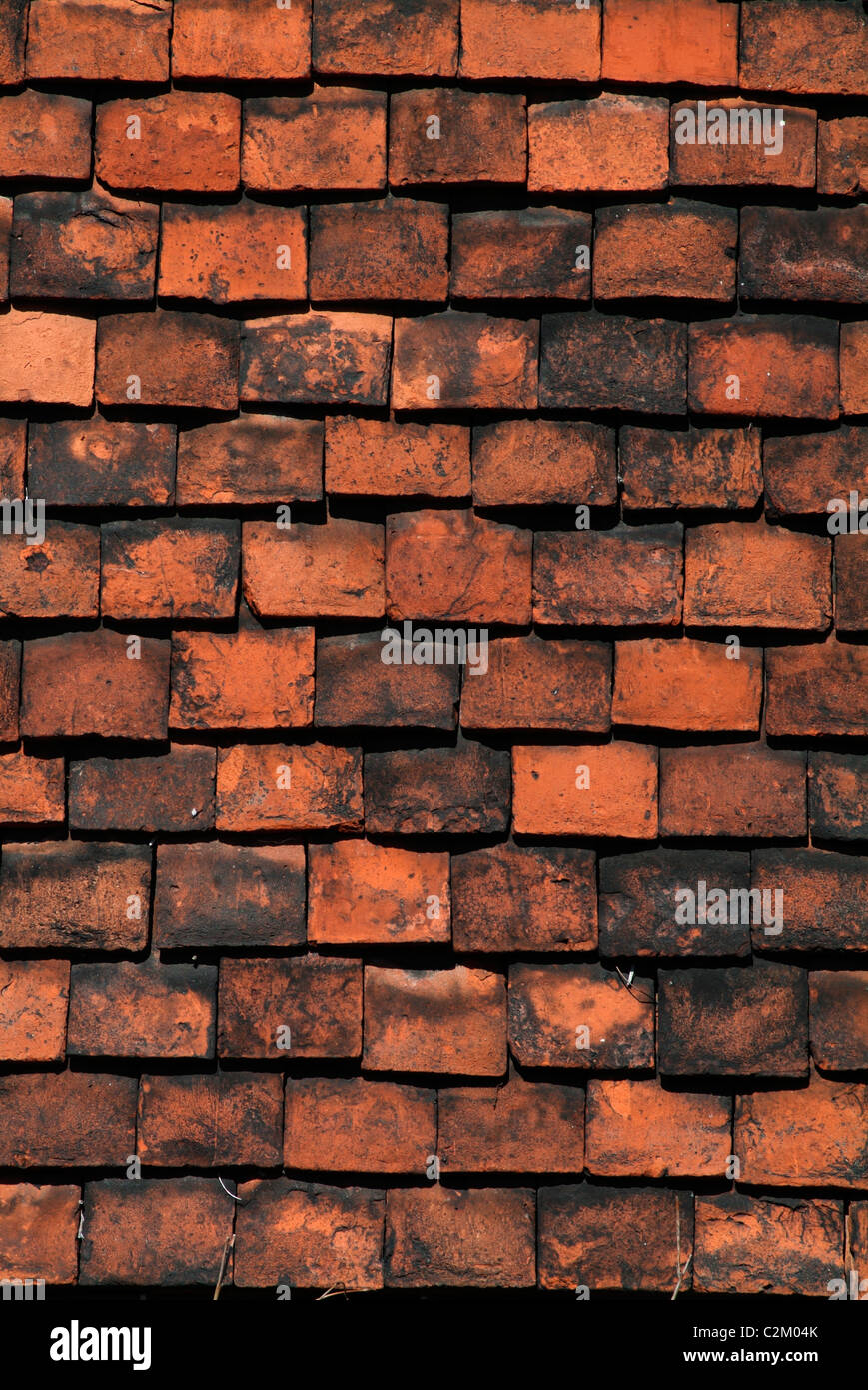 Backgrounds - red clay wall-hung rectangular shingle tiles Stock Photo ...