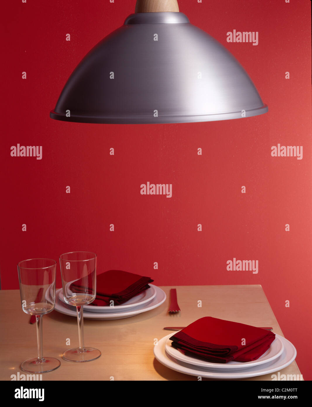 Contemporary Red Interior with Dining Table and Lamp Stock Photo - Alamy