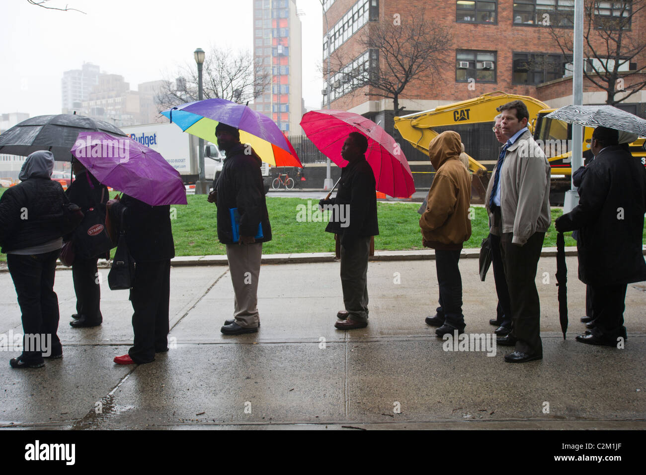 Job seekers line up for a job fair in downtown Brooklyn in New York on ...