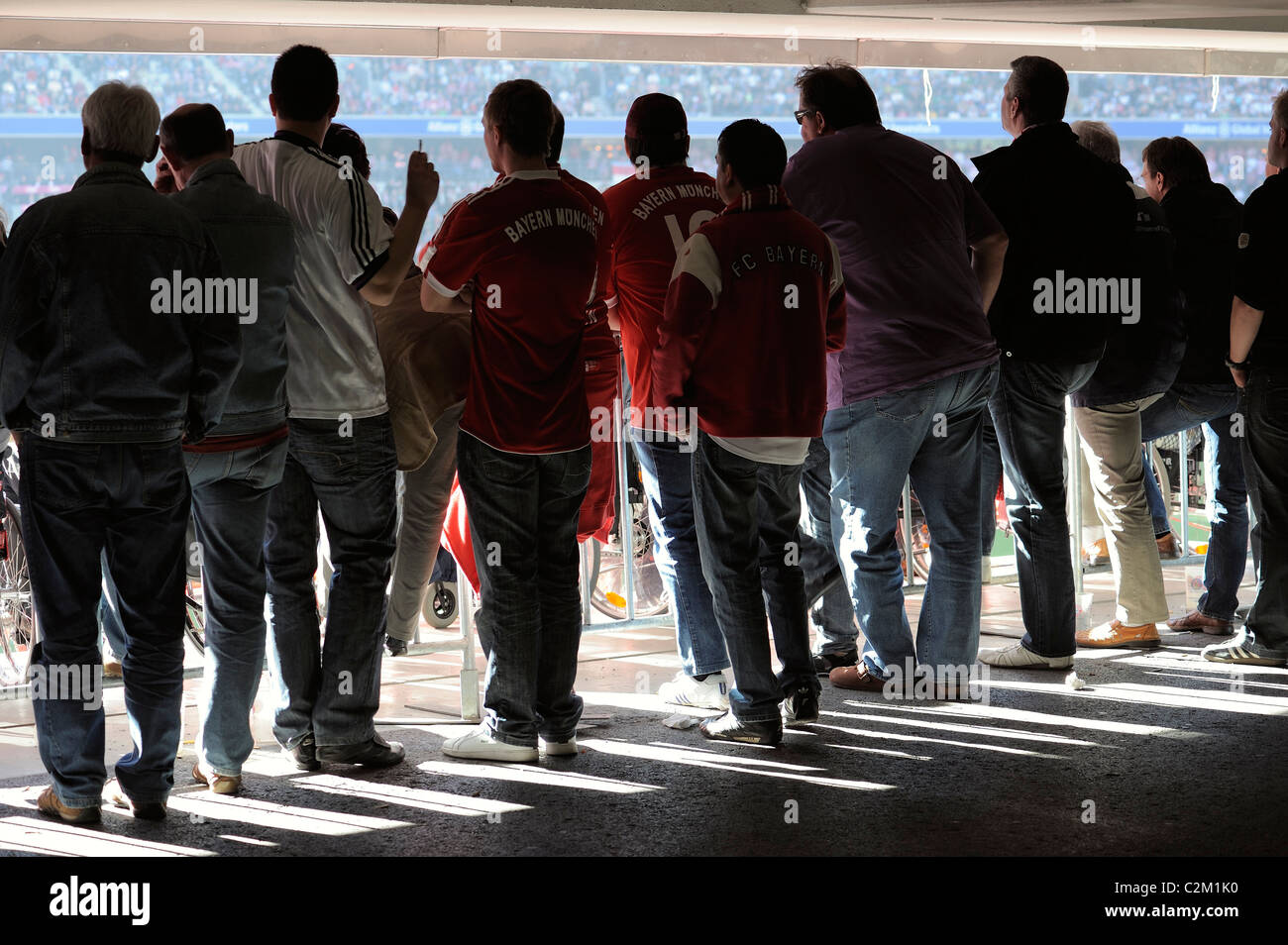 Football fans in stadium Stock Photo - Alamy