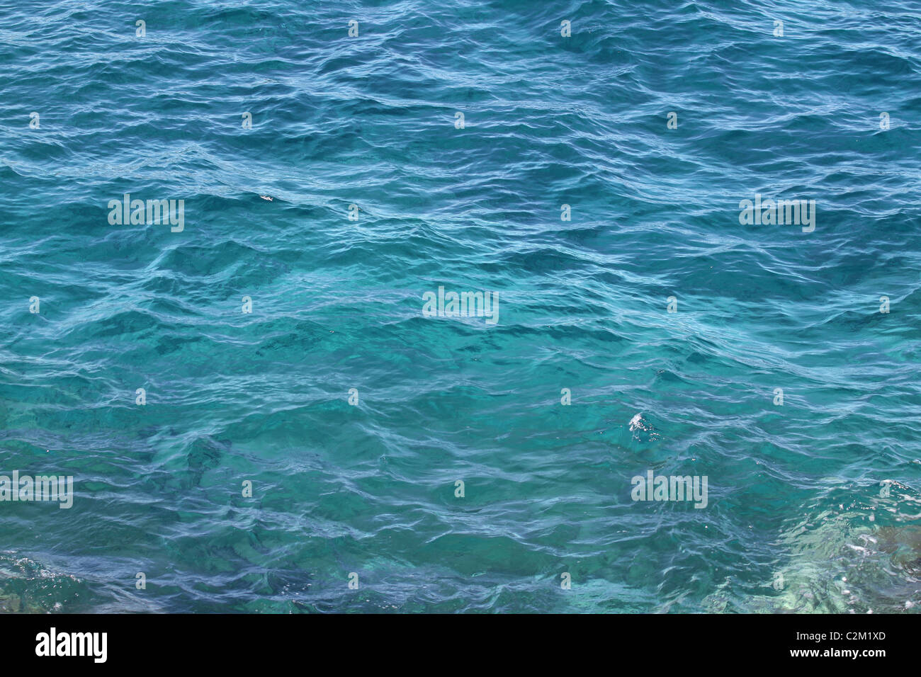 Sea closeup with sunlight and reflection wave pattern Stock Photo - Alamy