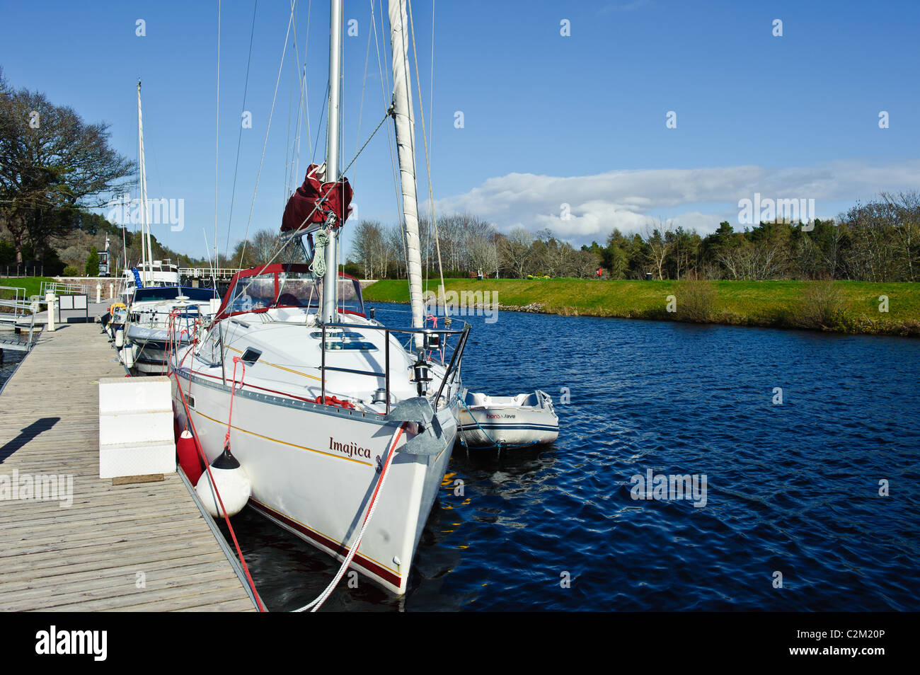 Yacht moored on the Caledonian Canal at Dochgarroch near Inverness ...