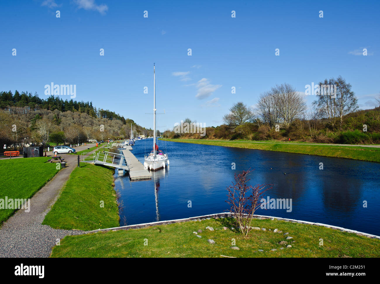 Yacht moored on the Caledonian Canal at Dochgarroch near Inverness ...