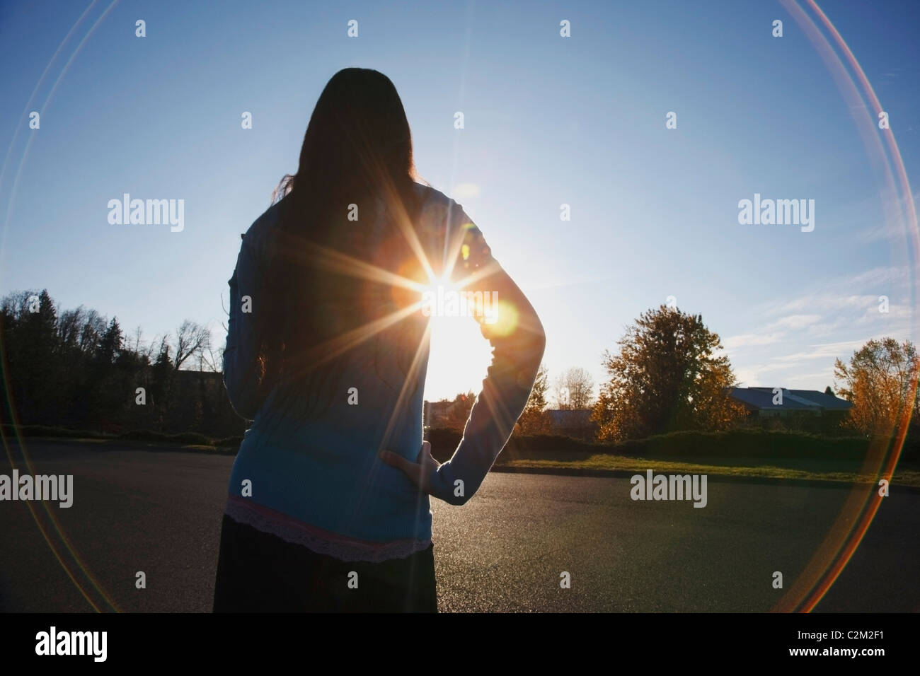 Beams Of Sunlight And A Circular Glare Around A Teenage Girl Stock ...