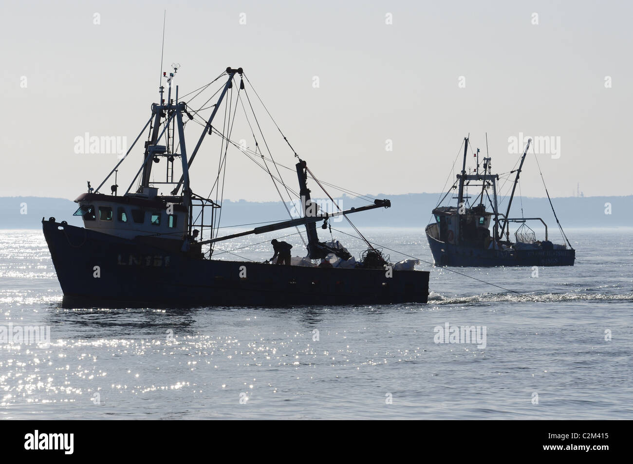 Dredge silhouette hi-res stock photography and images - Alamy