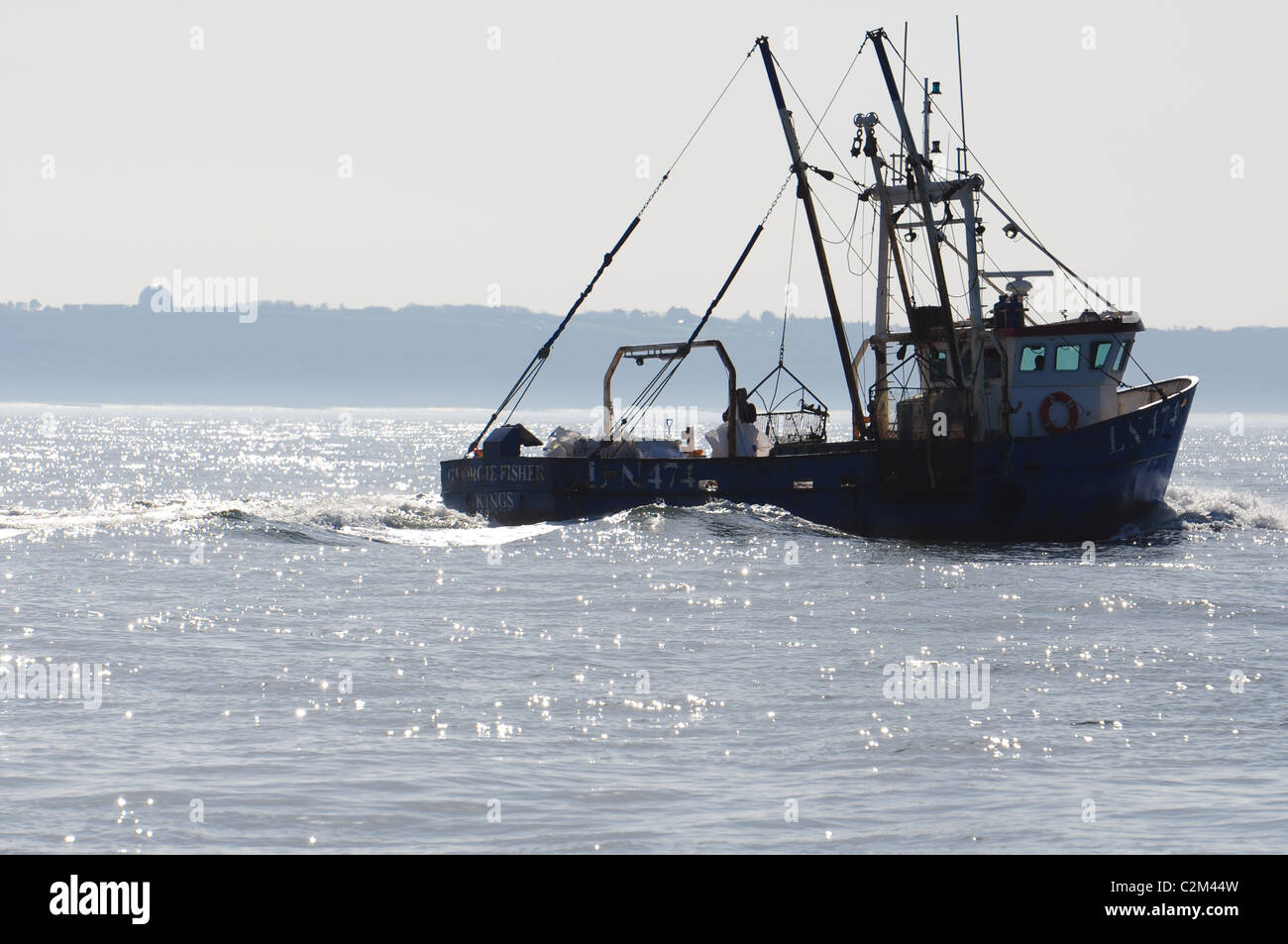 A mussel dredge preparing to dredge off Trimingham, Norfolk Stock Photo ...